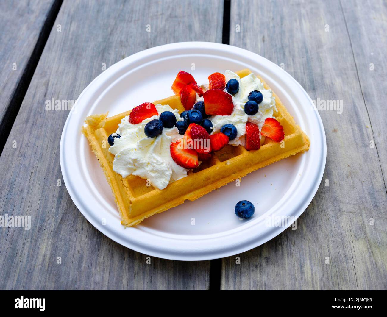Waffle with cream and fruit on a paper plate, Stavanger, Rogaland ...