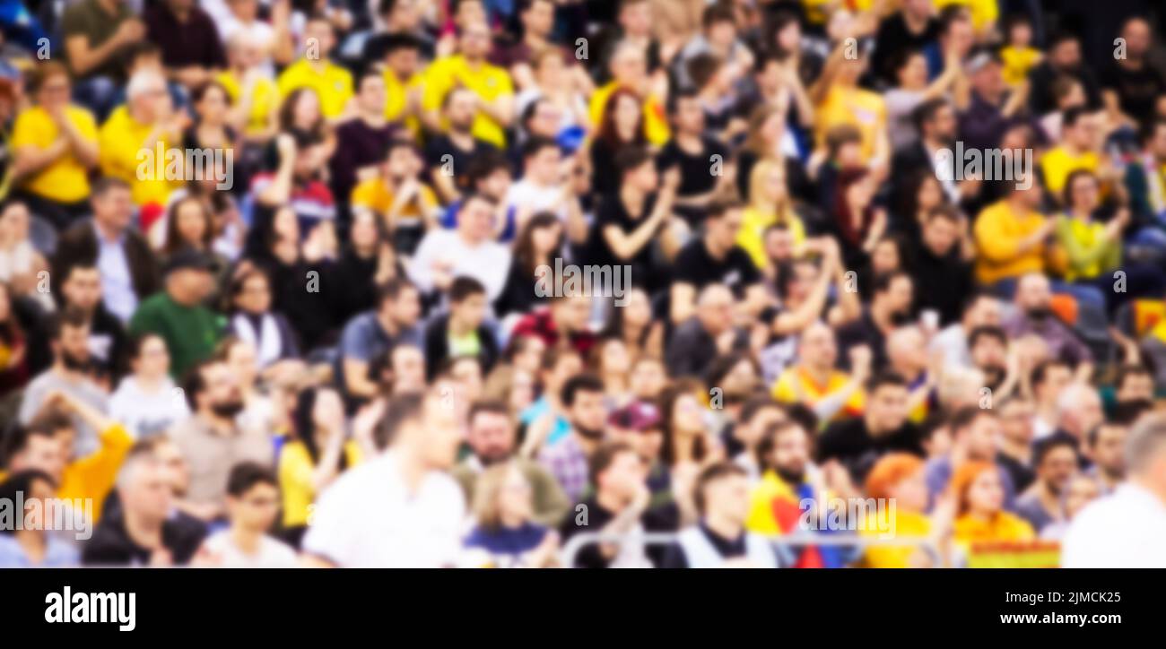 Blurred background of sport fans during a game Stock Photo - Alamy