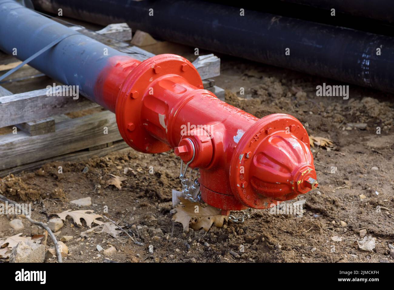 The fire hydrant is prepared for installation on the construction site ...