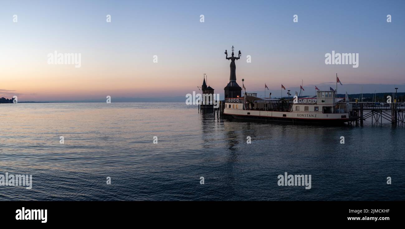 Morning light in the harbour of Constance with Imperia and and the ...