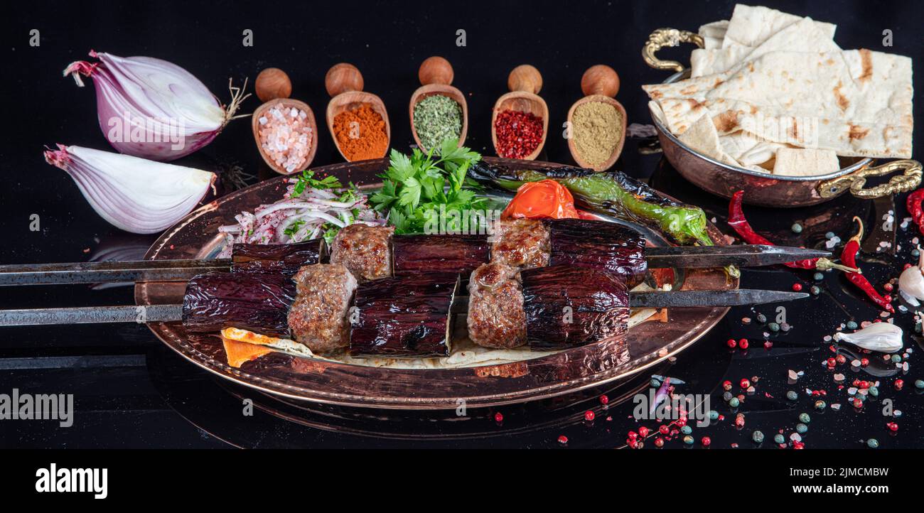 Traditional Turkish Kebabs Eggplant Kebab Adana Kebab With Tomatoes Peppers Garlic Bulgur