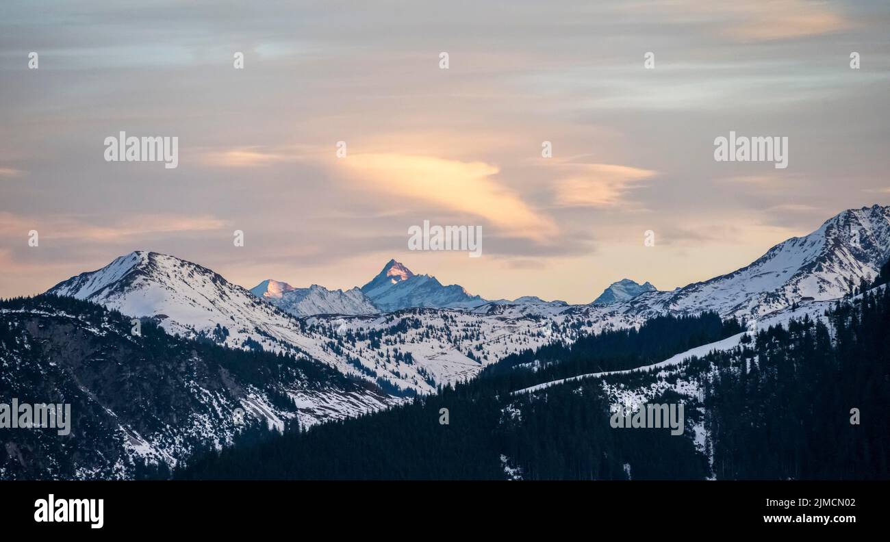 View of the Grossglockner, Alps in winter with snow-covered mountains ...