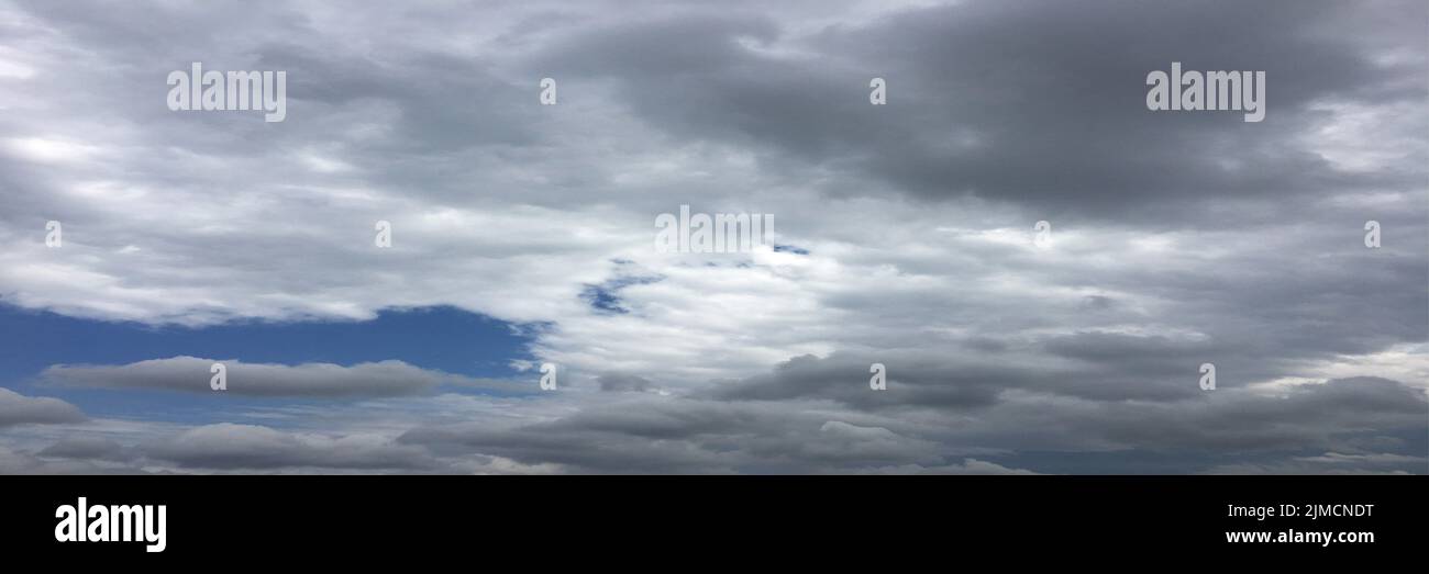 Thunder clouds, sky blue background. cloud blue sky Stock Photo - Alamy