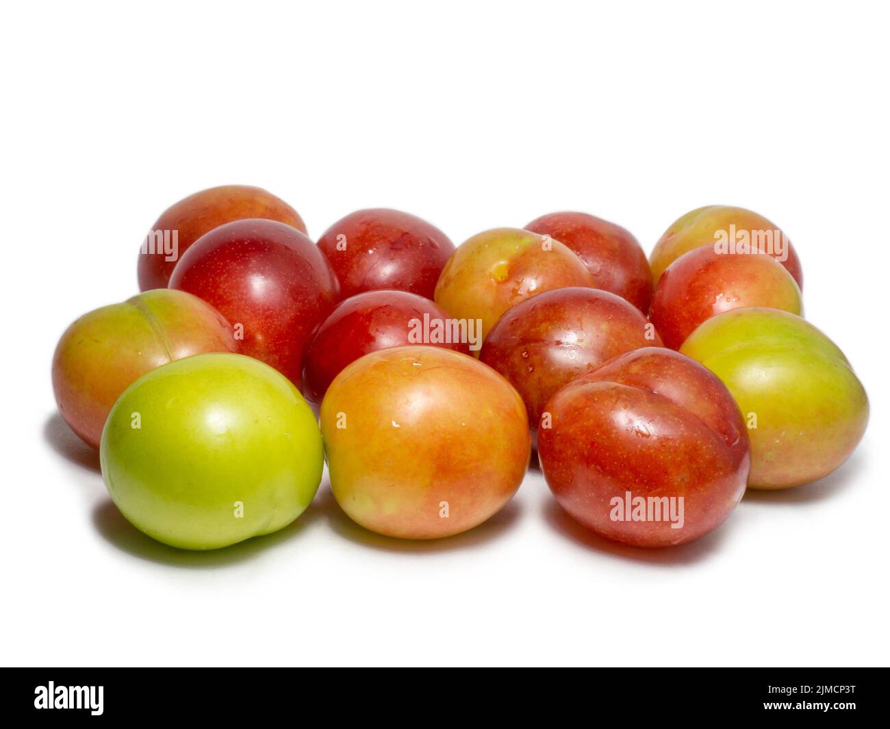 Plums for tkemali sauce. Several cherry plum fruits of varying degrees ...