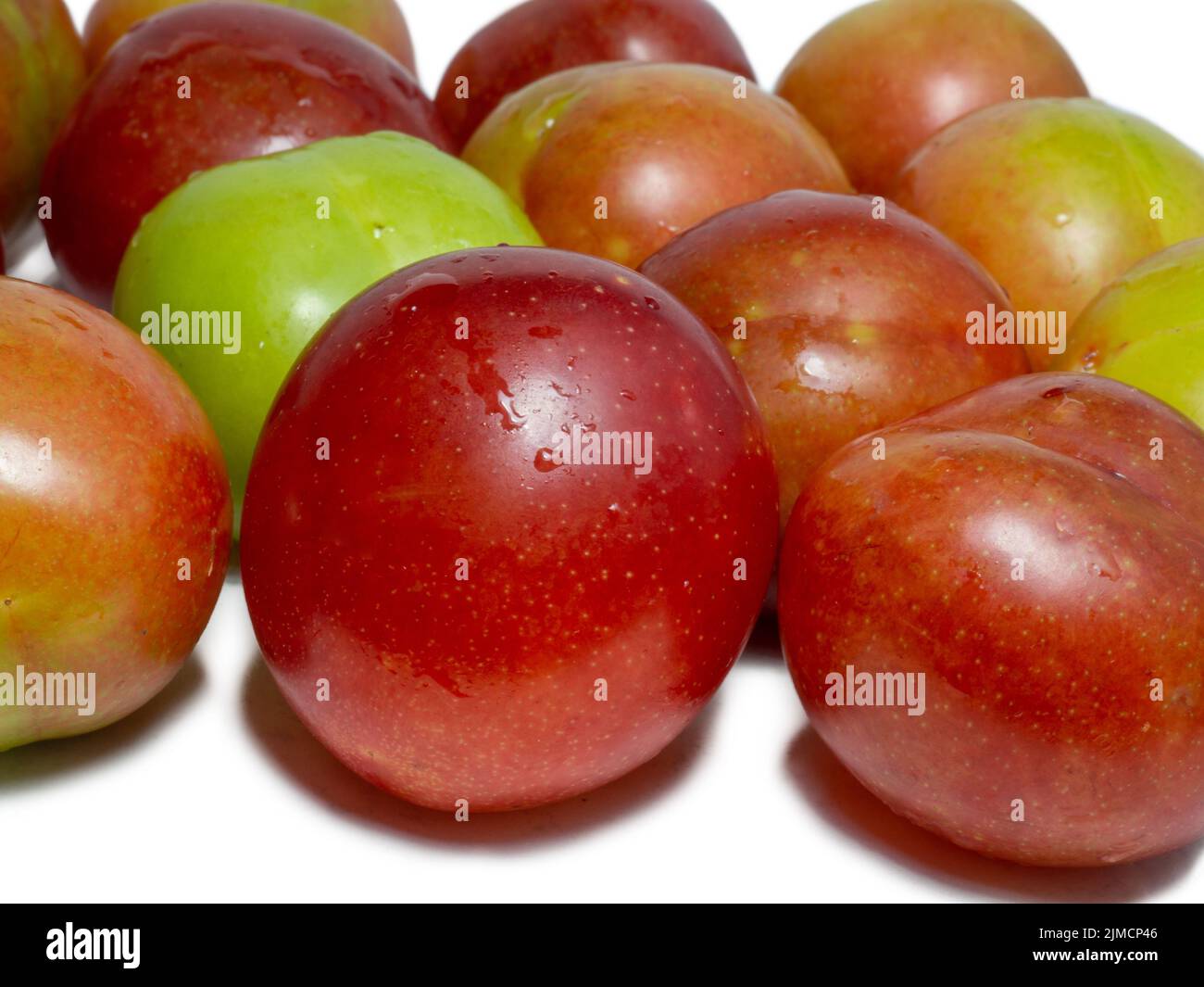 Plums for tkemali sauce. Several cherry plum fruits of varying degrees ...