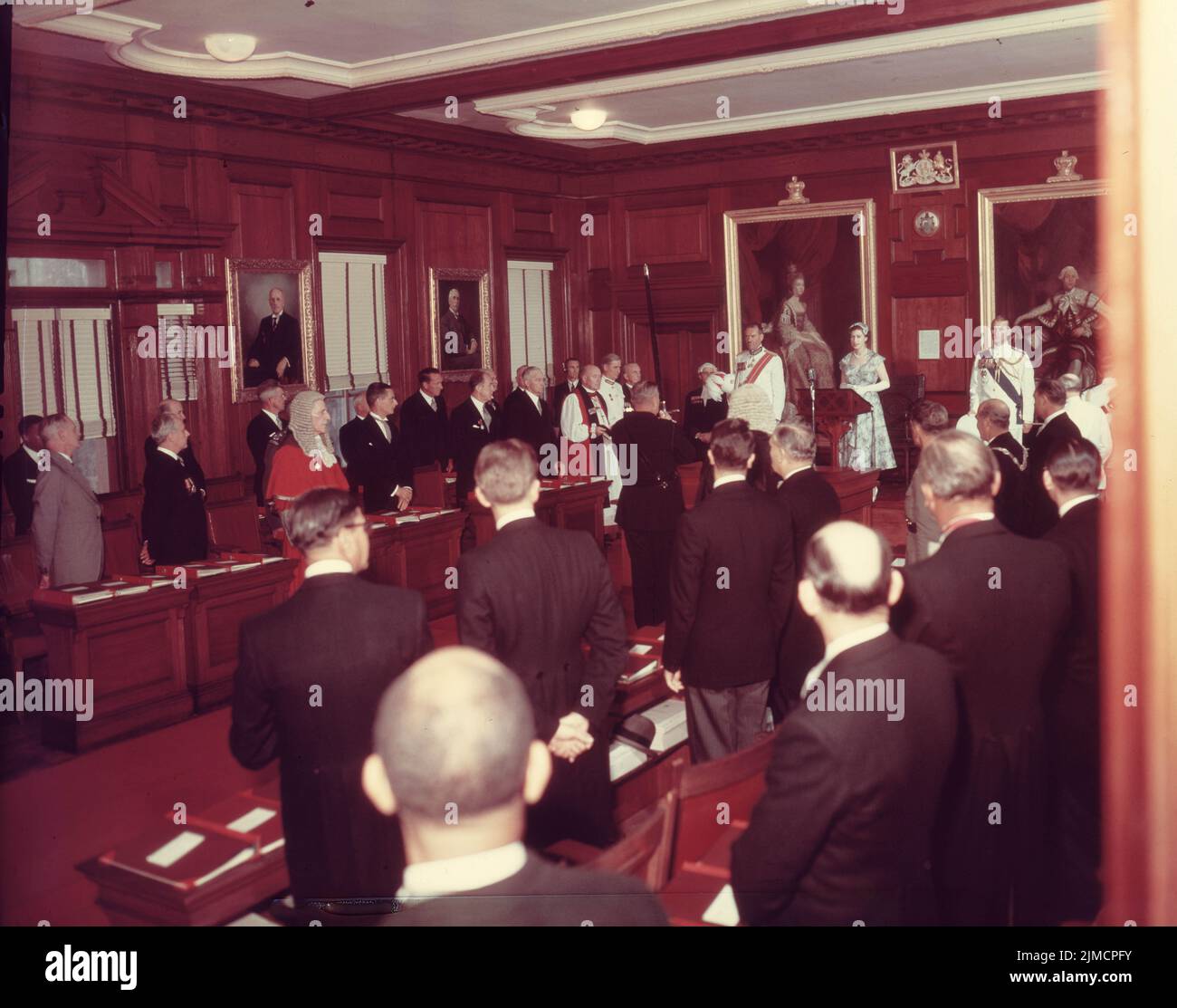 Circa 1954: Queen ELIZABETH II and Prince Philip talk to ministers ...