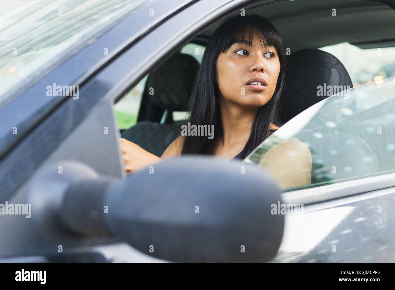 Asian female driver hi-res stock photography and images - Alamy