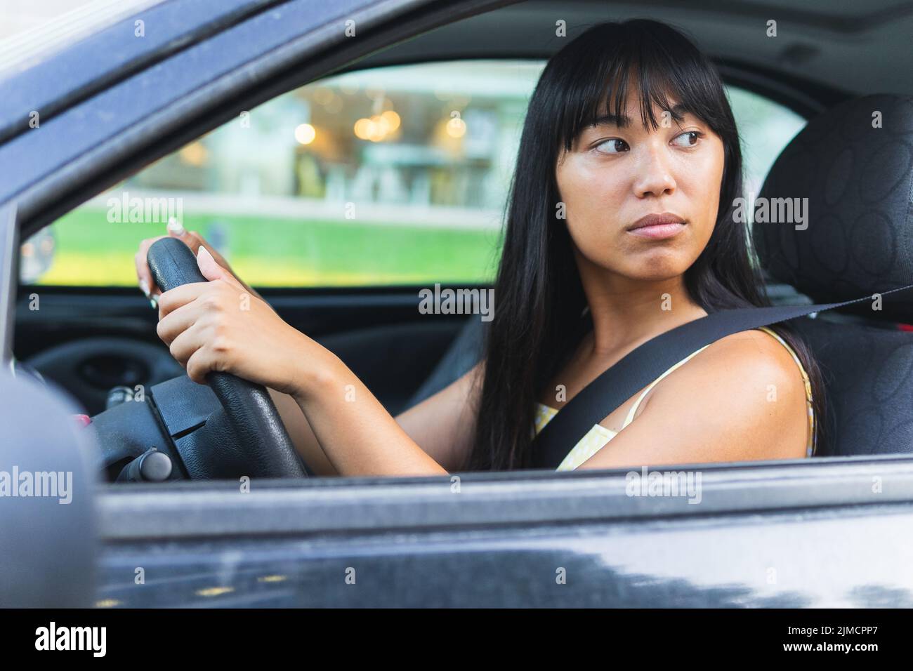 Asian female driver hi-res stock photography and images - Alamy