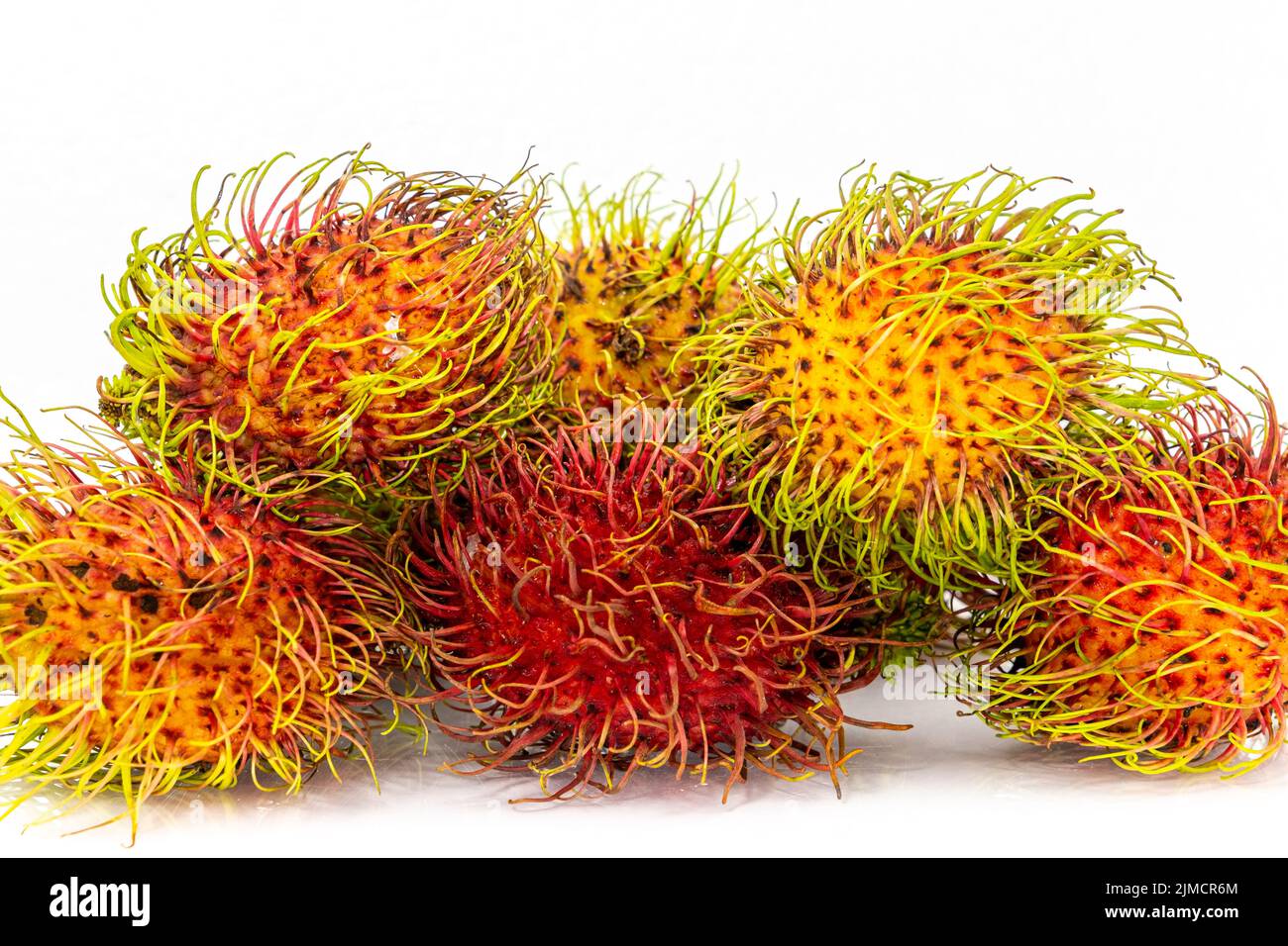 The fresh rambutan isolate with green leaf. Fresh Rambutan in bamboo ...