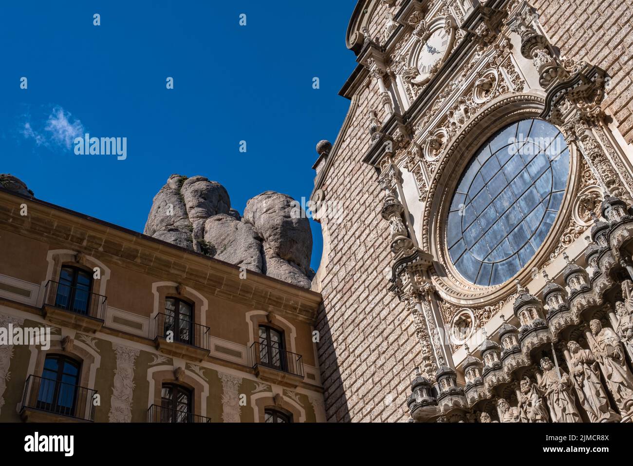Low-angle view of the decorated facade of the Basilica of the Monastery ...