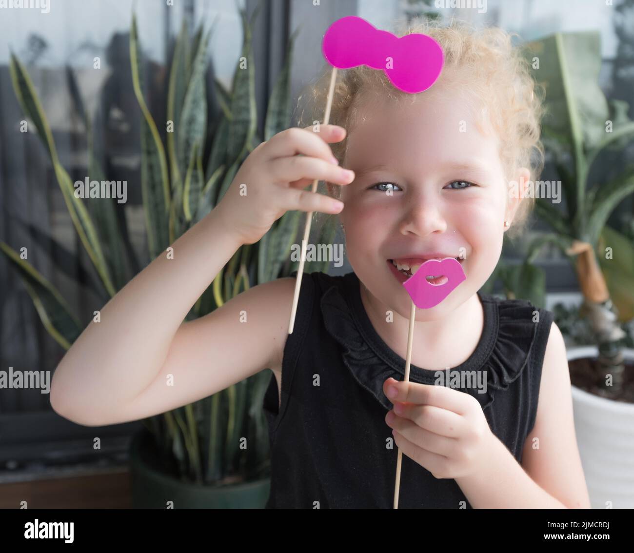 Funny little girl portrait Stock Photo - Alamy