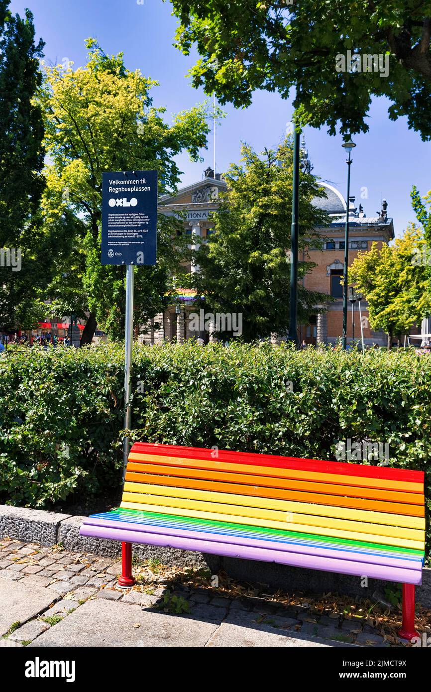 Bench in rainbow colours with welcome sign of the Oxlo initiative, Oslo ...