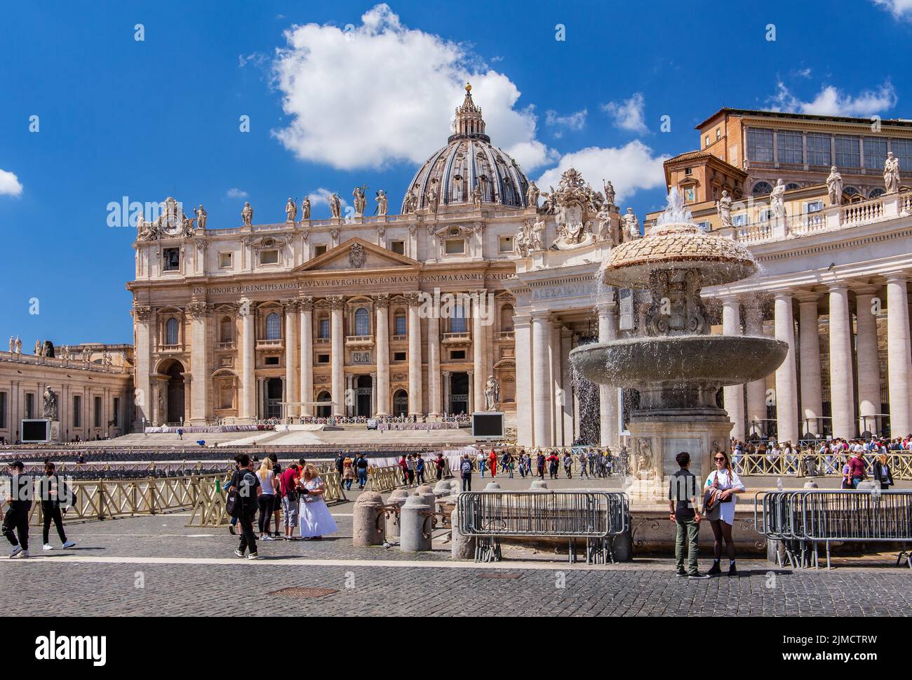 Northern Fountain in St. Peter's Square with St. Peter's Basilica, Rome ...
