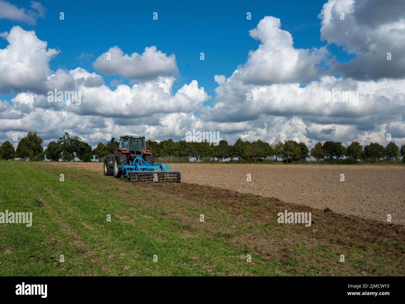 Agriculture, tractor ploughing the field, Berlin, Germany Stock Photo ...