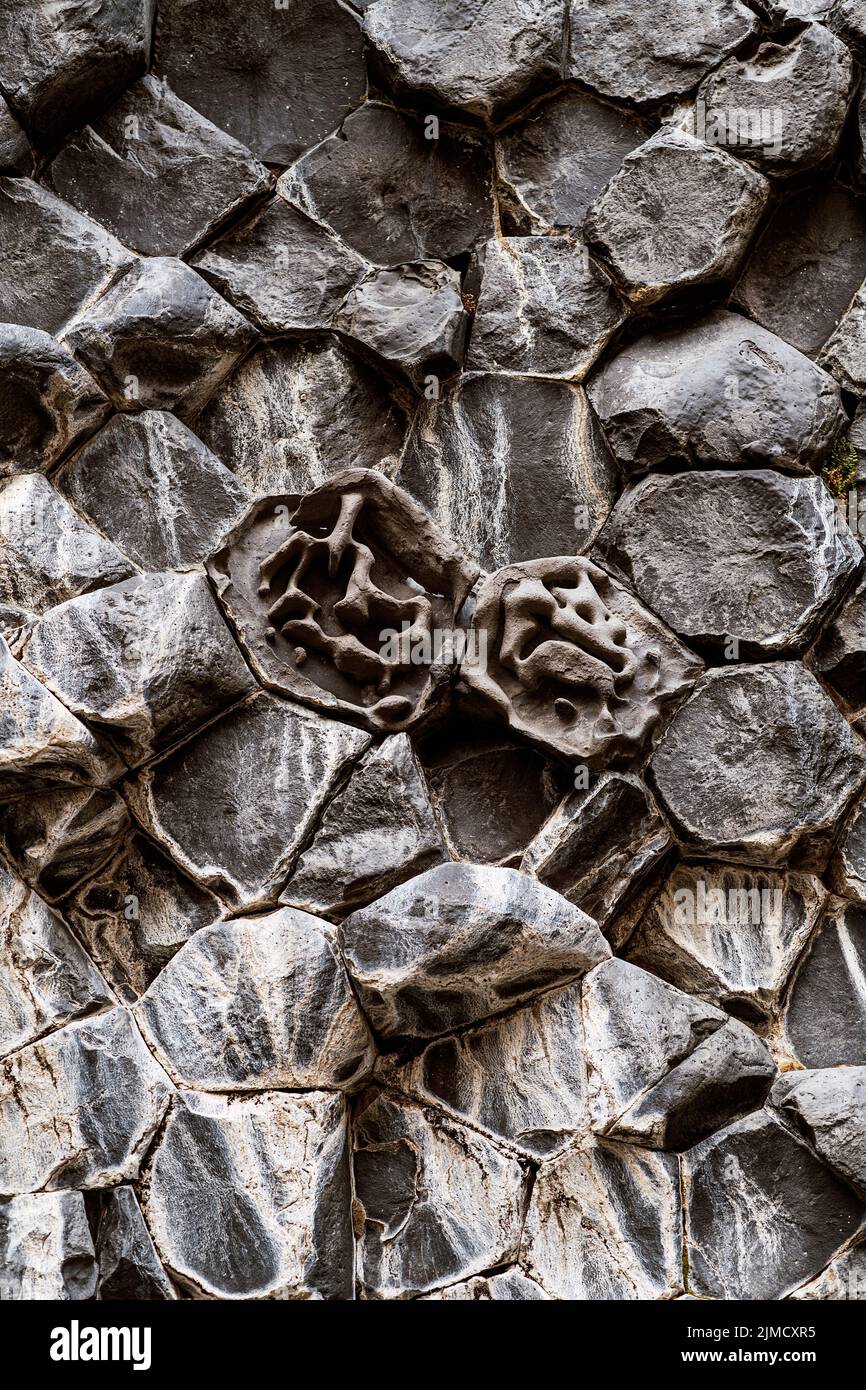 From below of textured surface of columnar basalt rock formation as ...