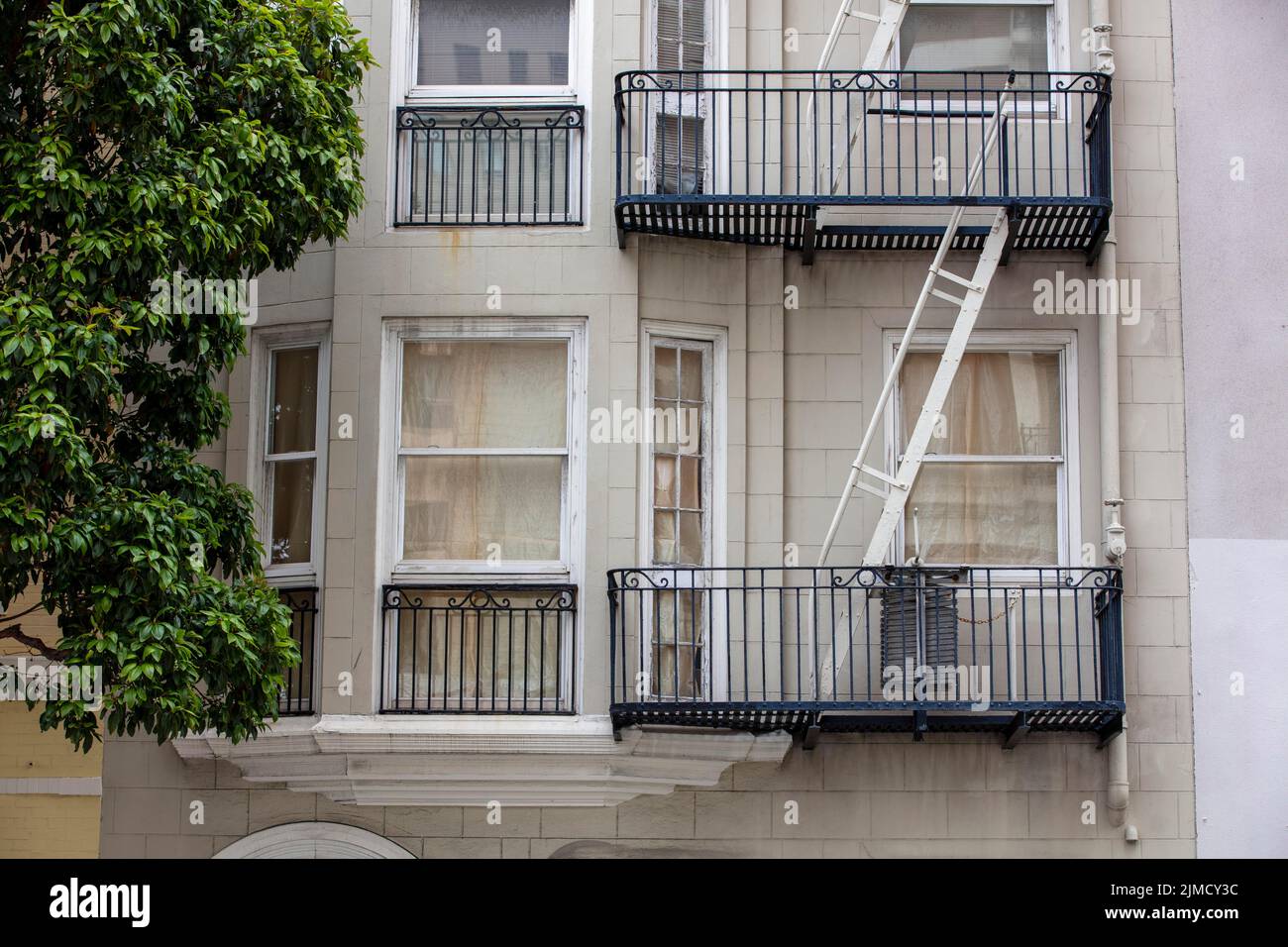 Windows and escape stairs, downtown building, San Francisco, California ...
