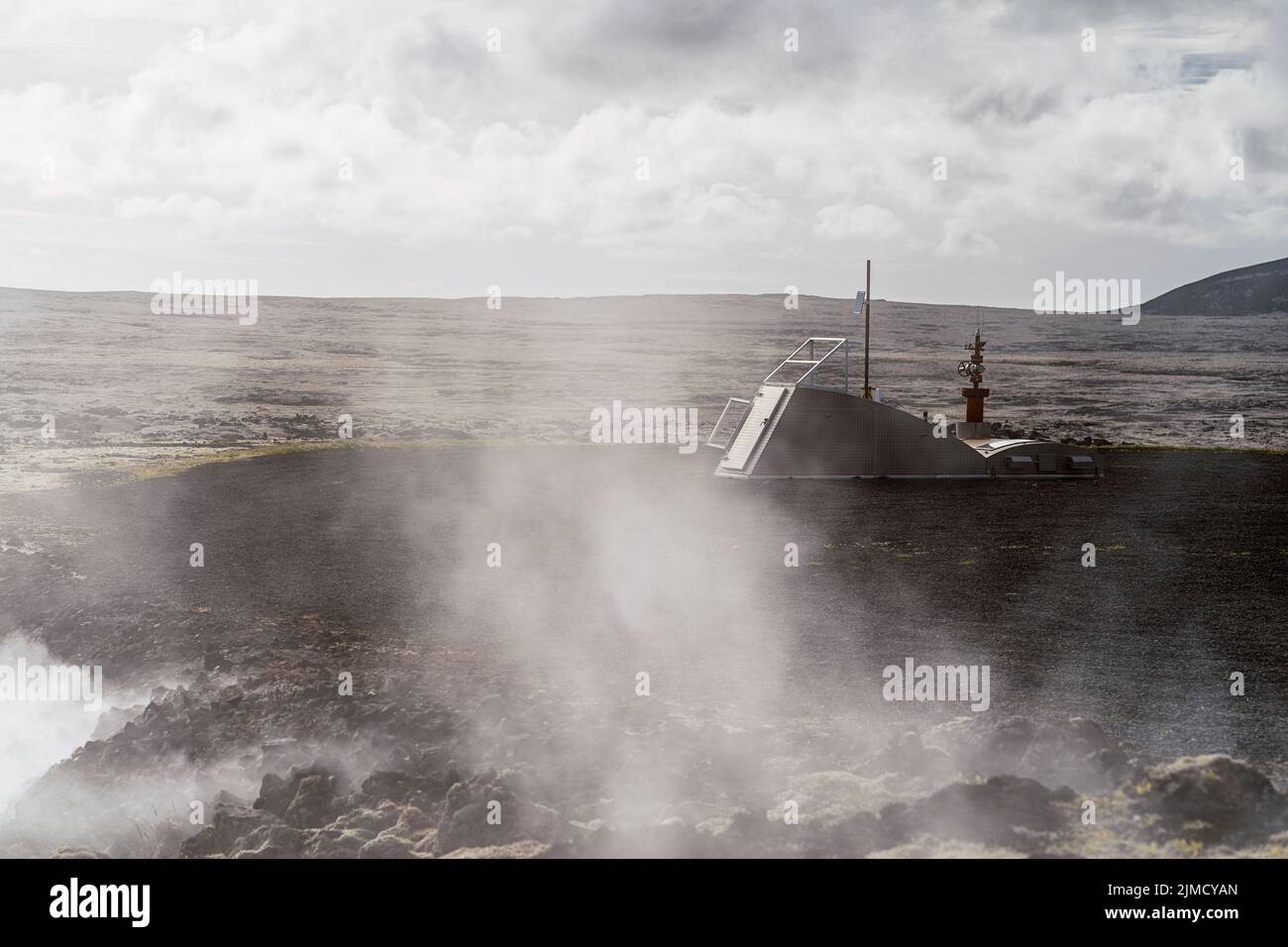 Aerial view of modern geothermal power plant located on volcanic ...