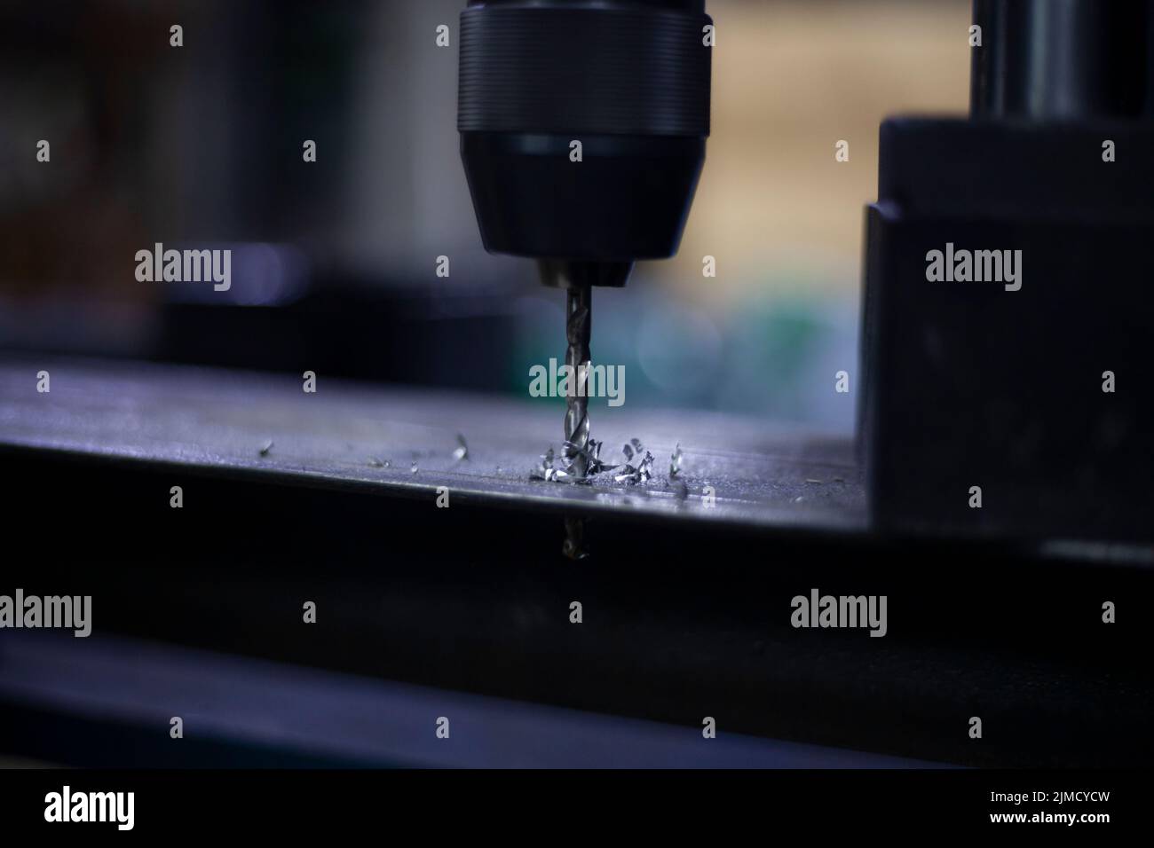 A modern drill for creating holes in metal. Work as a drill in the ...