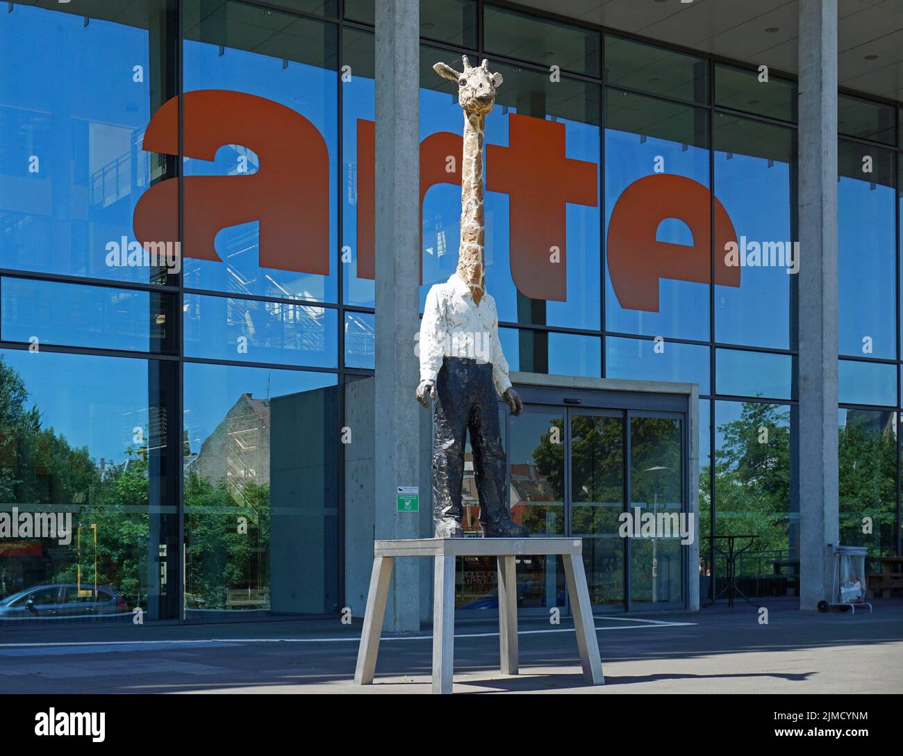 Artwork Giraffe Man by Stephan Balkenhol, in front of the building of ...