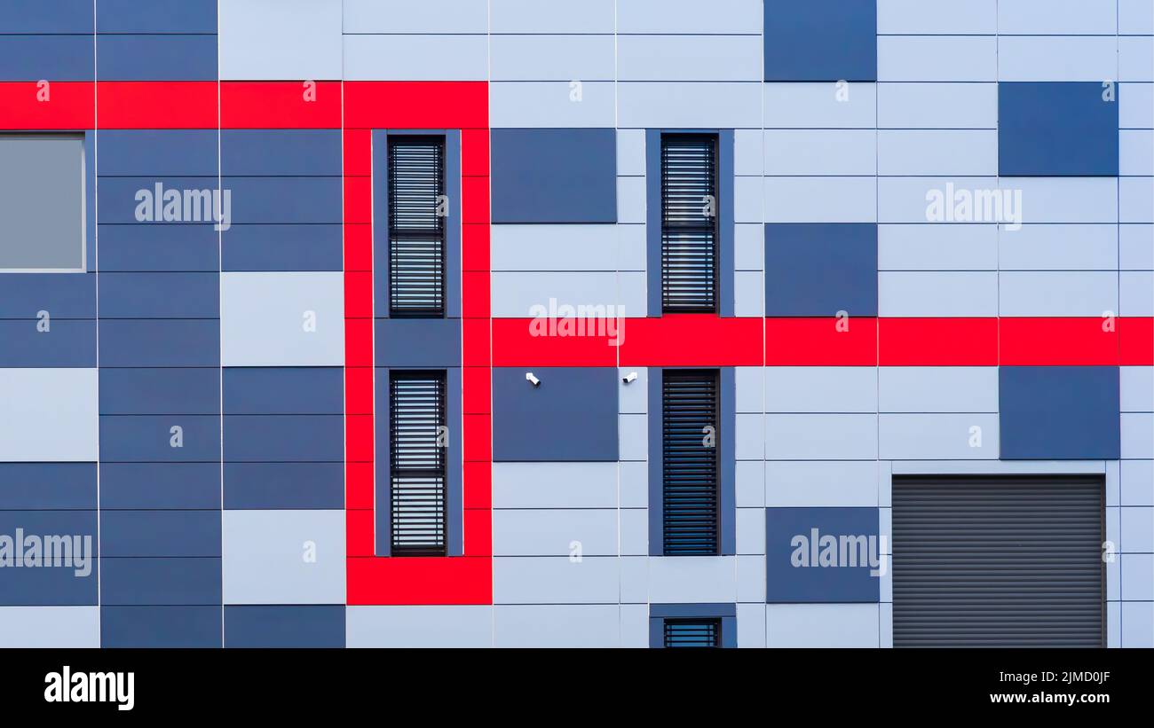 Full frame exterior of contemporary building with black ventilation ...