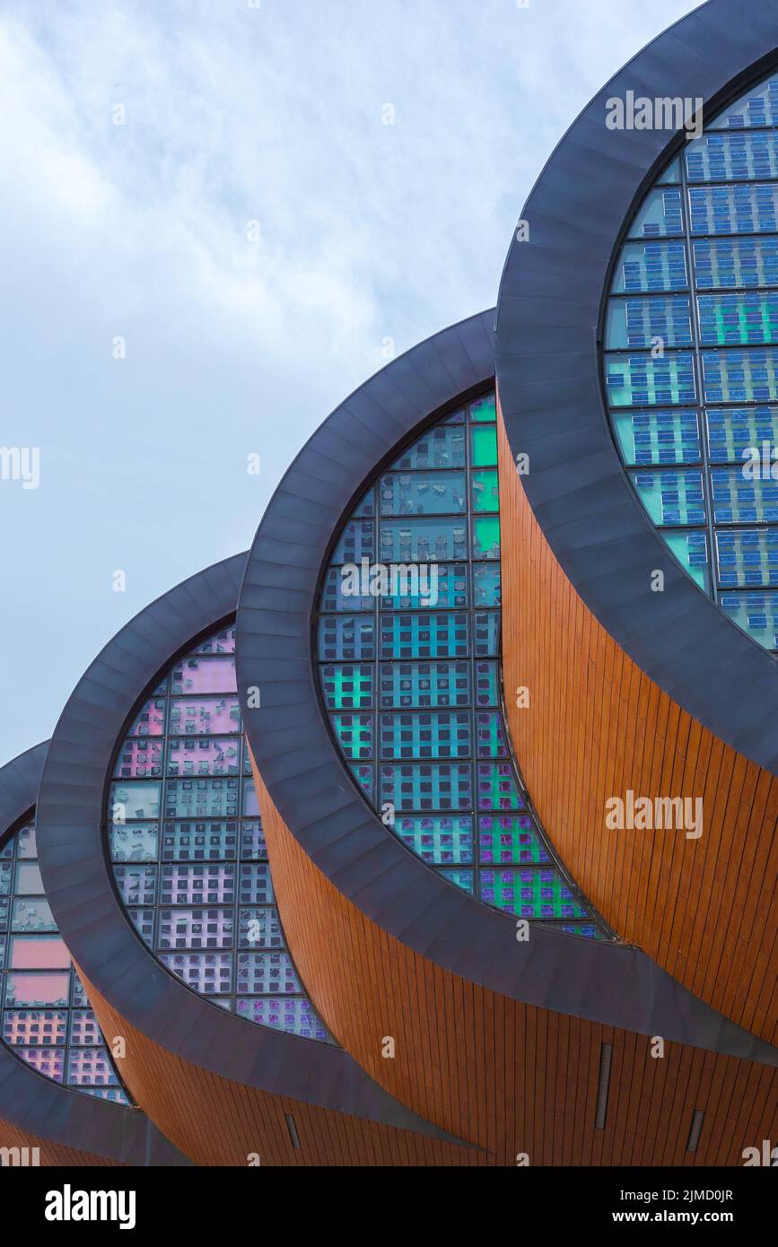 Facades of contemporary round shaped buildings with unusual ...