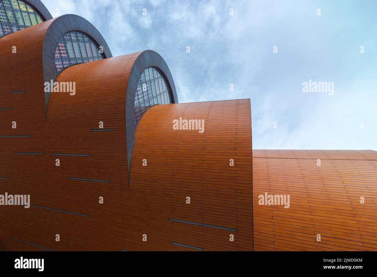 Facades of contemporary round shaped buildings with unusual ...