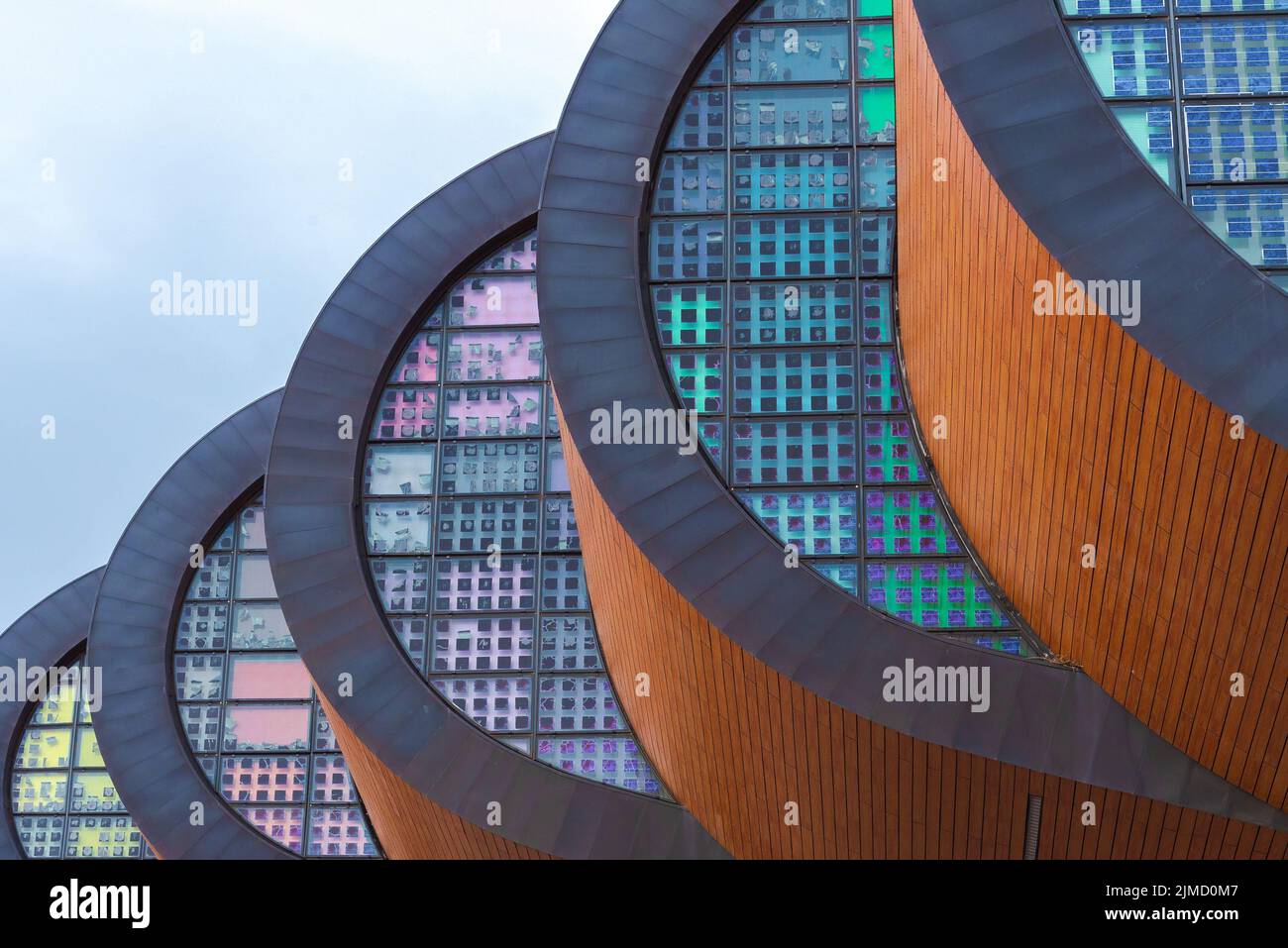 Facades of contemporary round shaped buildings with unusual ...