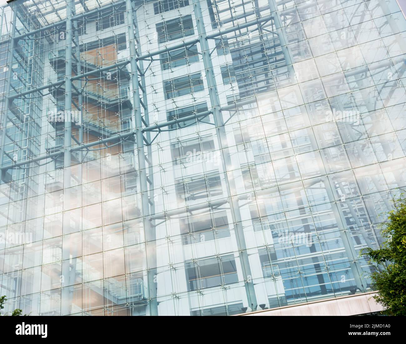 Architectural background of a modern high-rise building with a clear ...