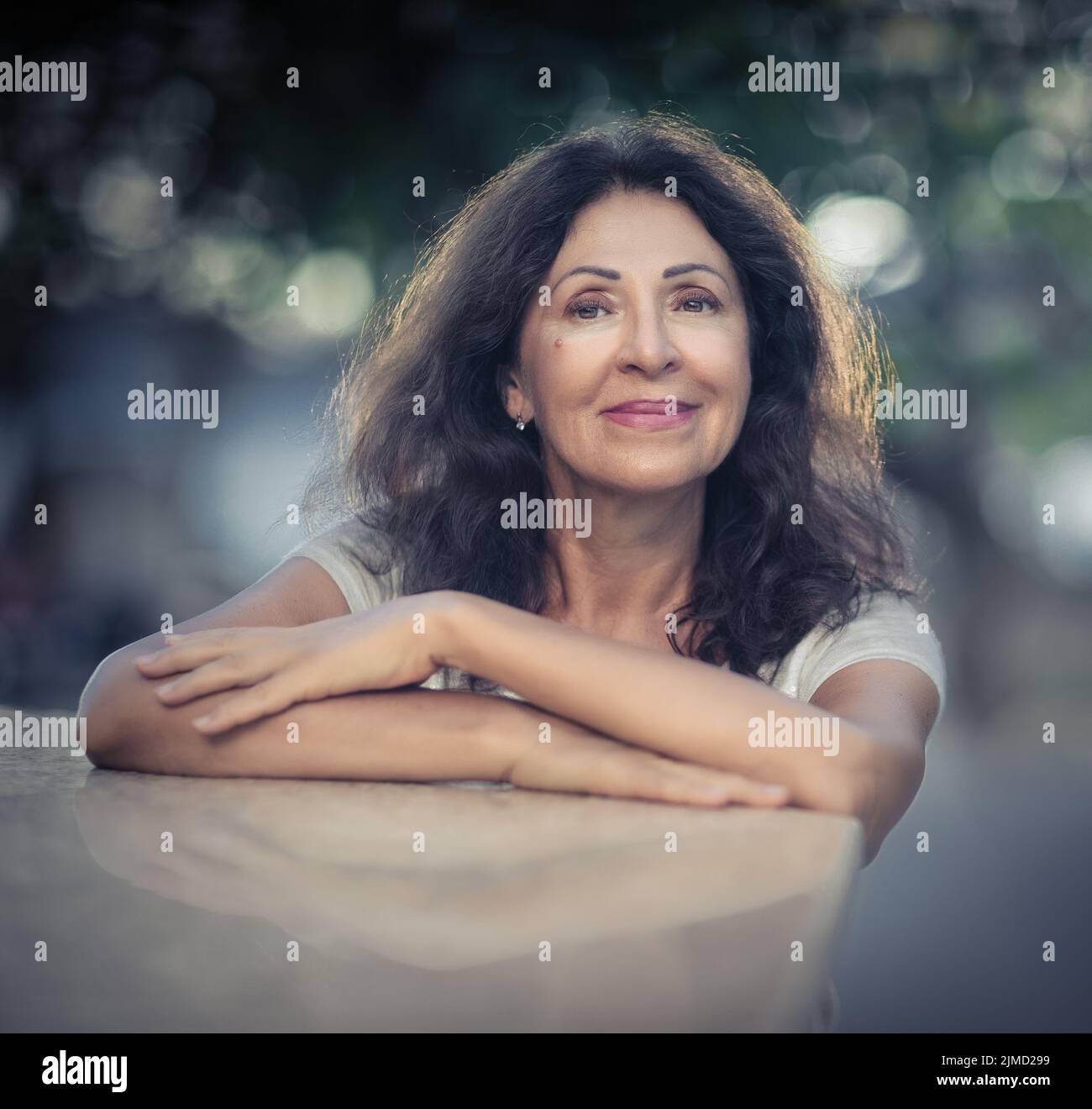 Outdoor portrait of a beautiful senior woman Stock Photo - Alamy