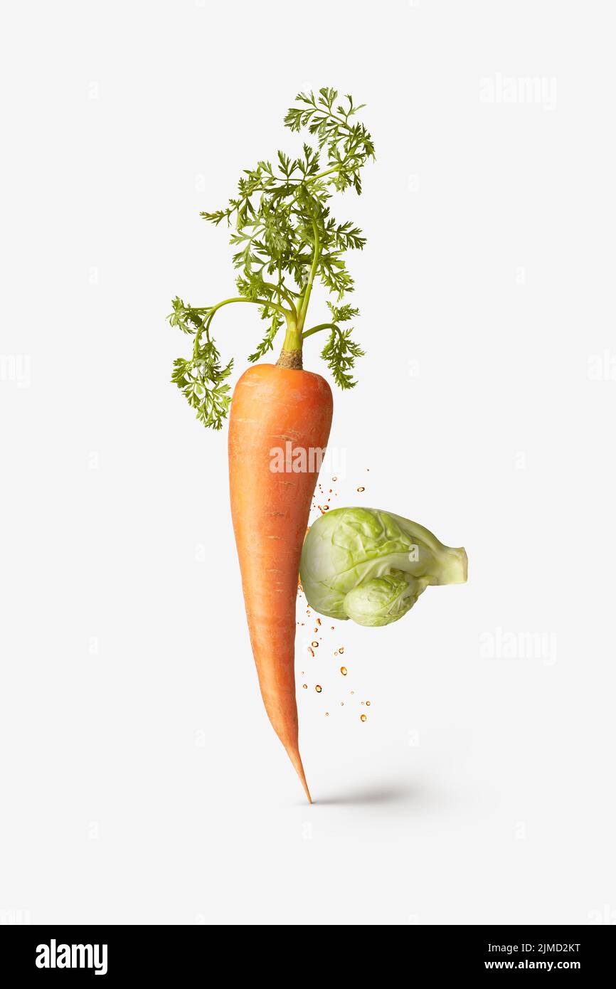 Natural cabbage as a boxing glove is punching carrot vegetable Stock ...