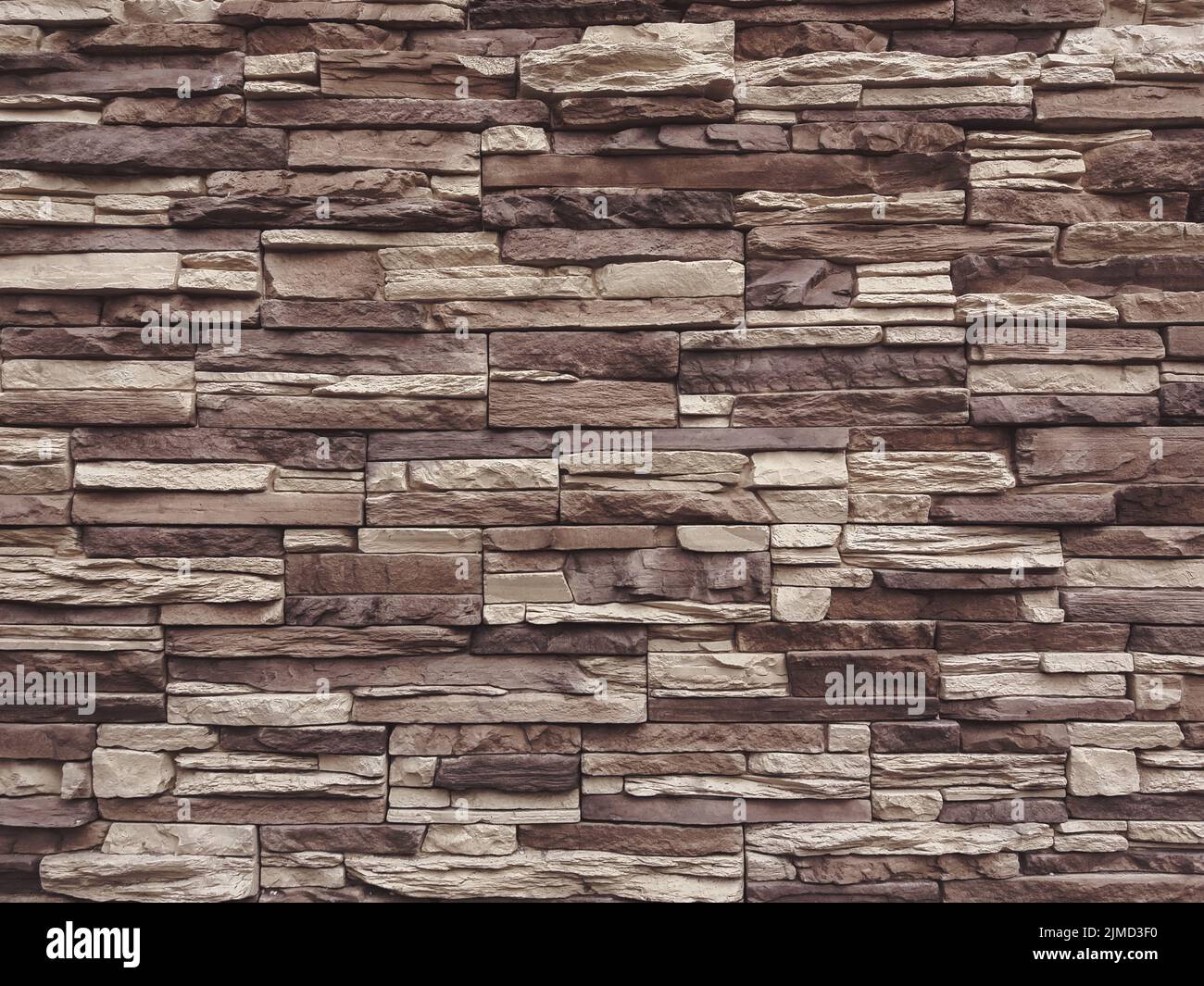 Dark beige and brown slate stone wall texture Stock Photo - Alamy