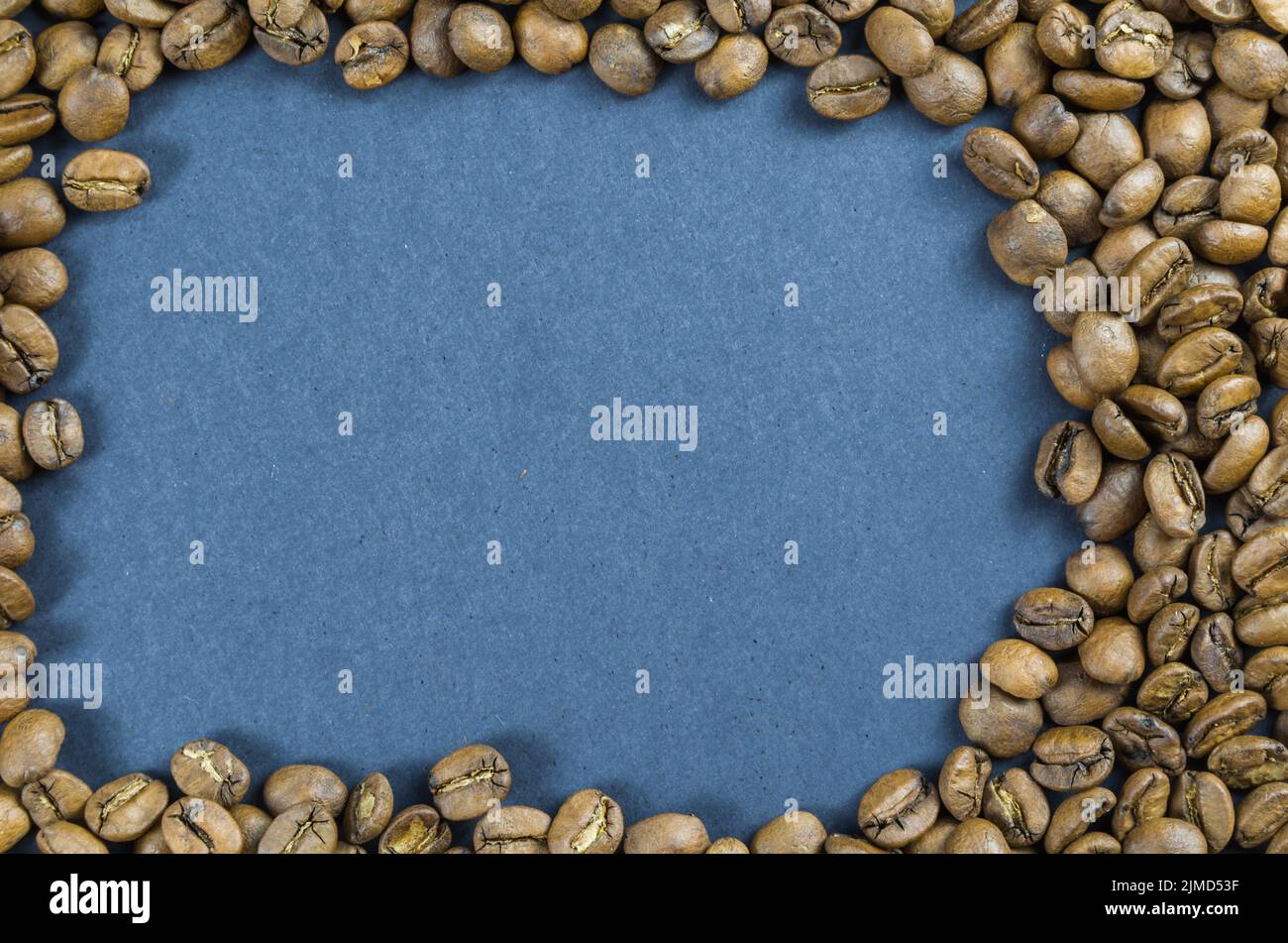 Texture, background of whole coffee beans, raw Stock Photo - Alamy