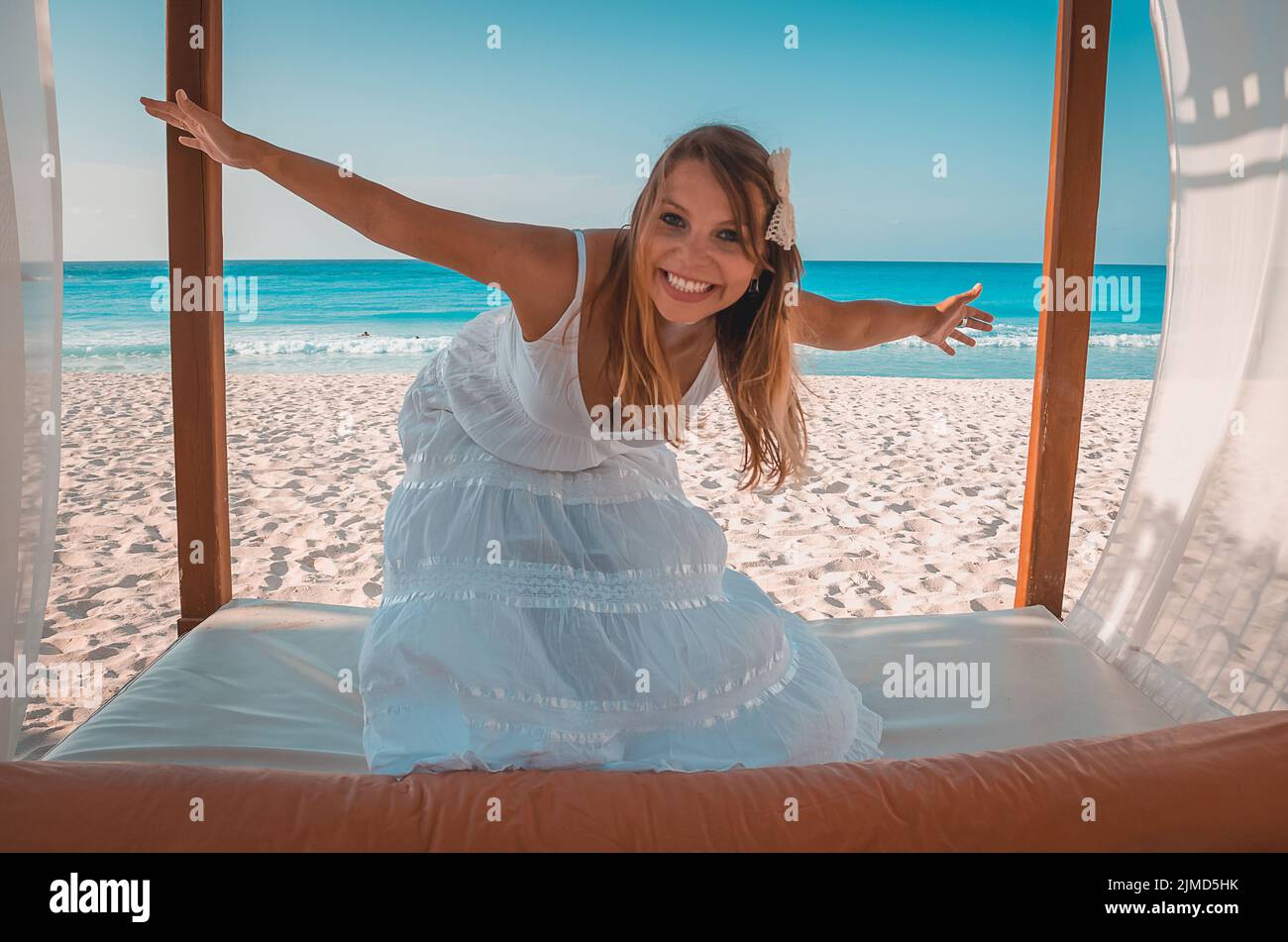 Happy woman with open arms on the Caribbean beach border Stock Photo ...