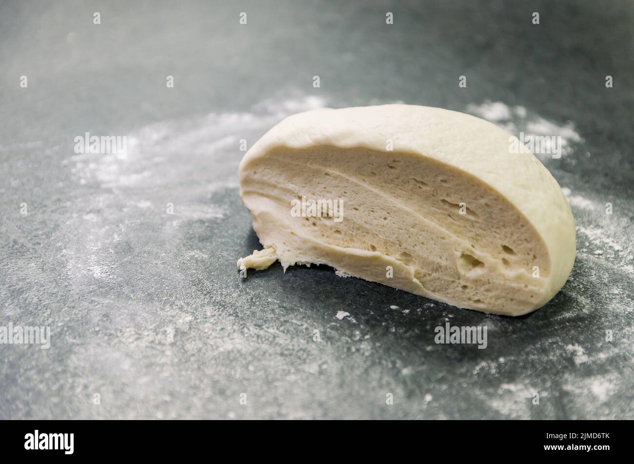 Preparation of pizza dough, dough resting Stock Photo - Alamy
