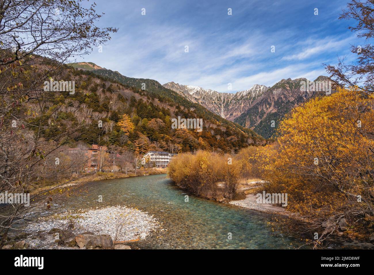 Nature landscape at Kamikochi Japan, autumn fall foliage with pond and ...