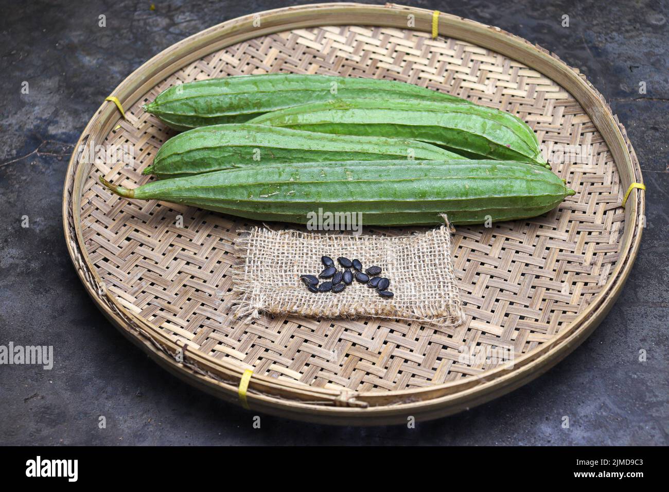 Ridges Gourd stock with seed on farm for farming Stock Photo - Alamy