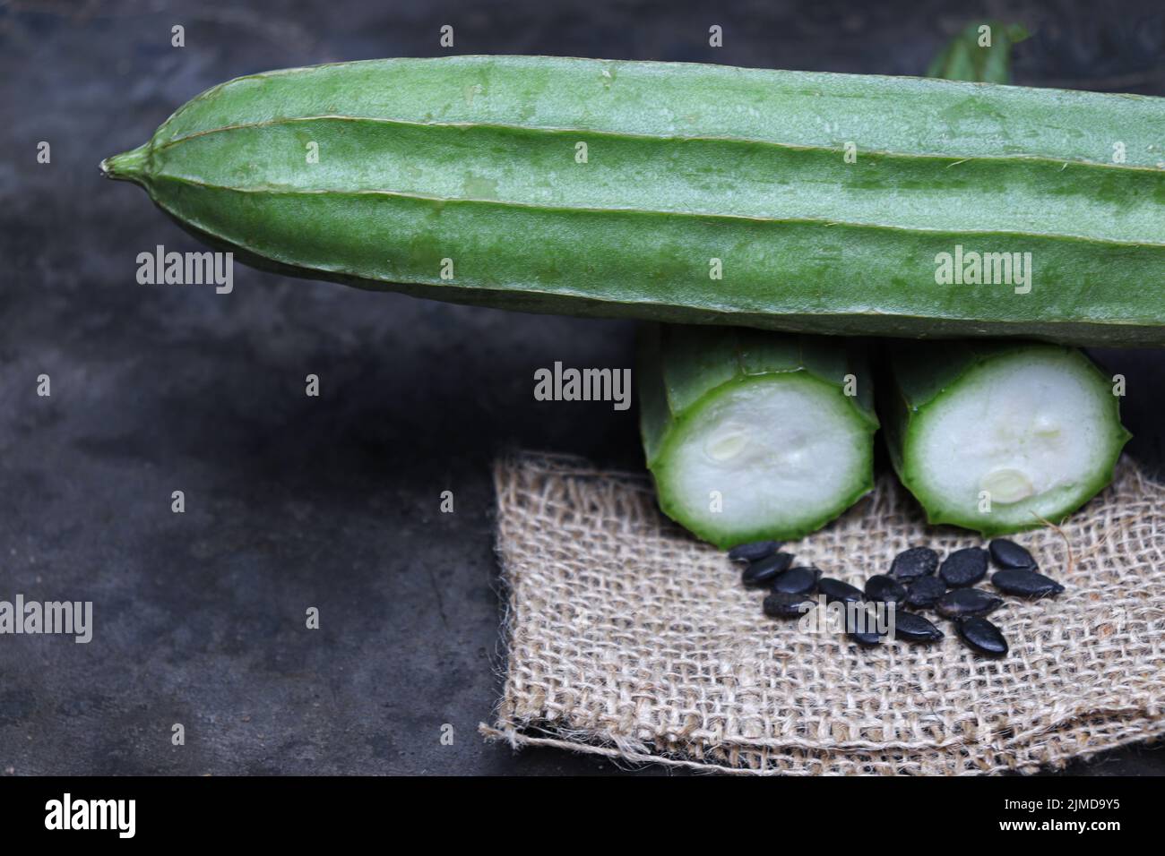 Ridges Gourd stock with seed on farm for farming Stock Photo - Alamy