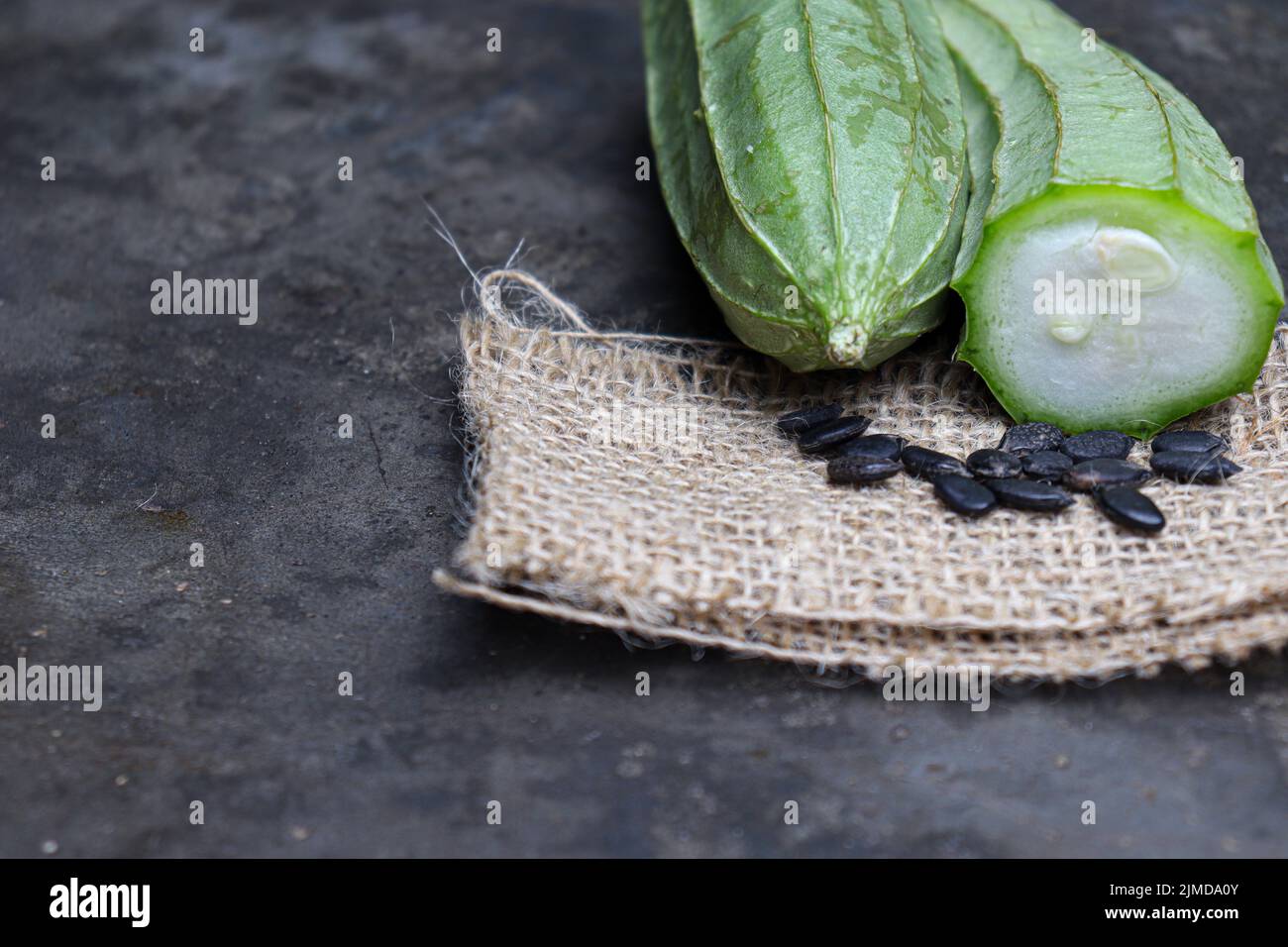 Ridges Gourd stock with seed on farm for farming Stock Photo - Alamy