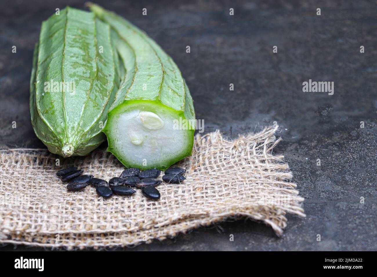 Ridges Gourd stock with seed on farm for farming Stock Photo - Alamy