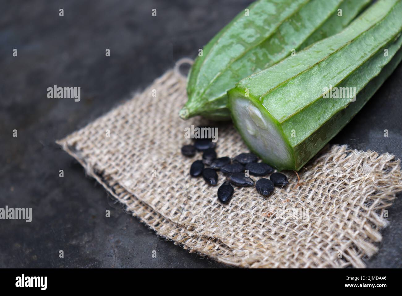 Ridges Gourd stock with seed on farm for farming Stock Photo - Alamy