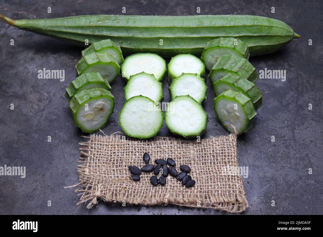 Ridges Gourd stock with seed on farm for farming Stock Photo - Alamy