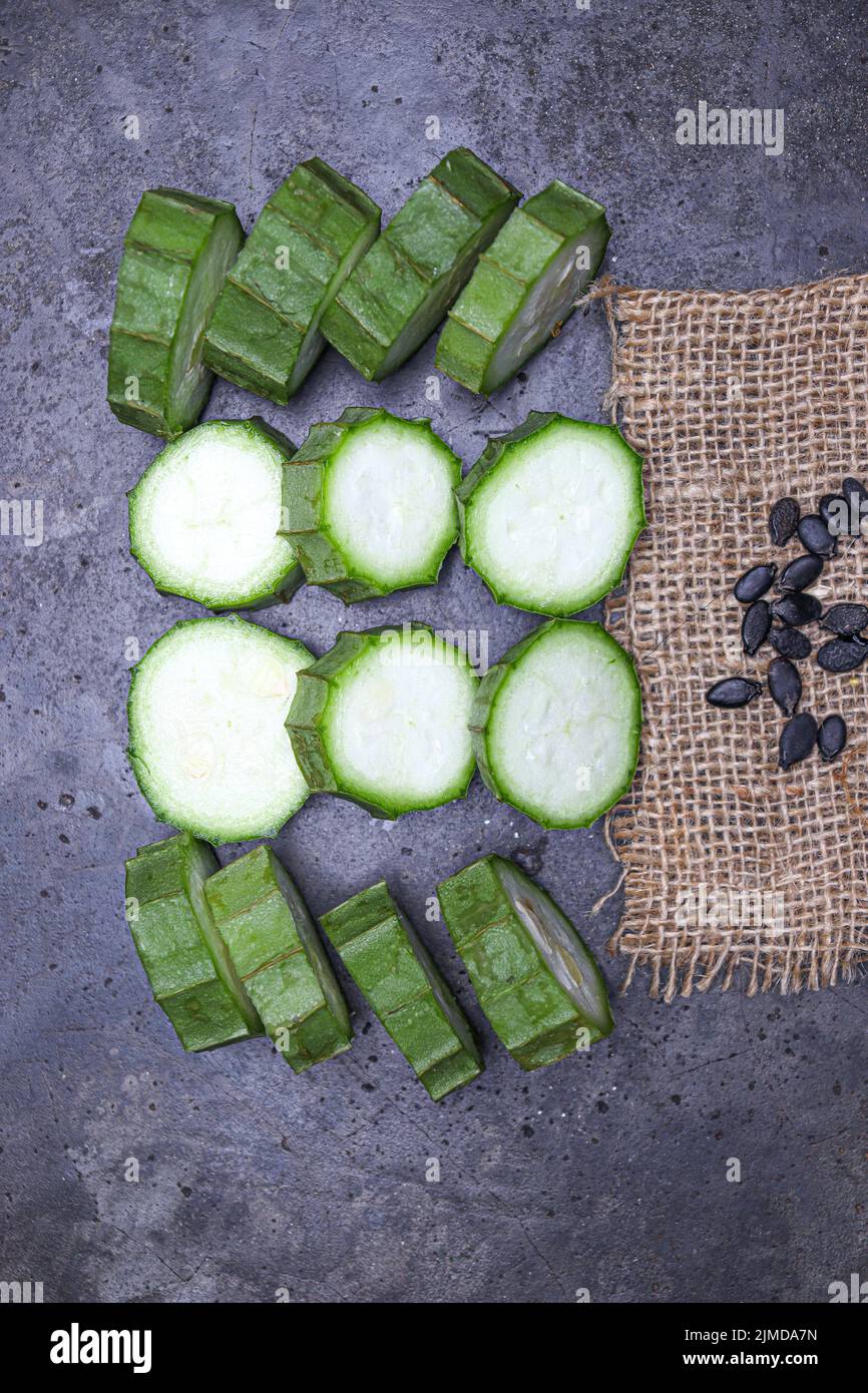 Ridges Gourd stock with seed on farm for farming Stock Photo - Alamy
