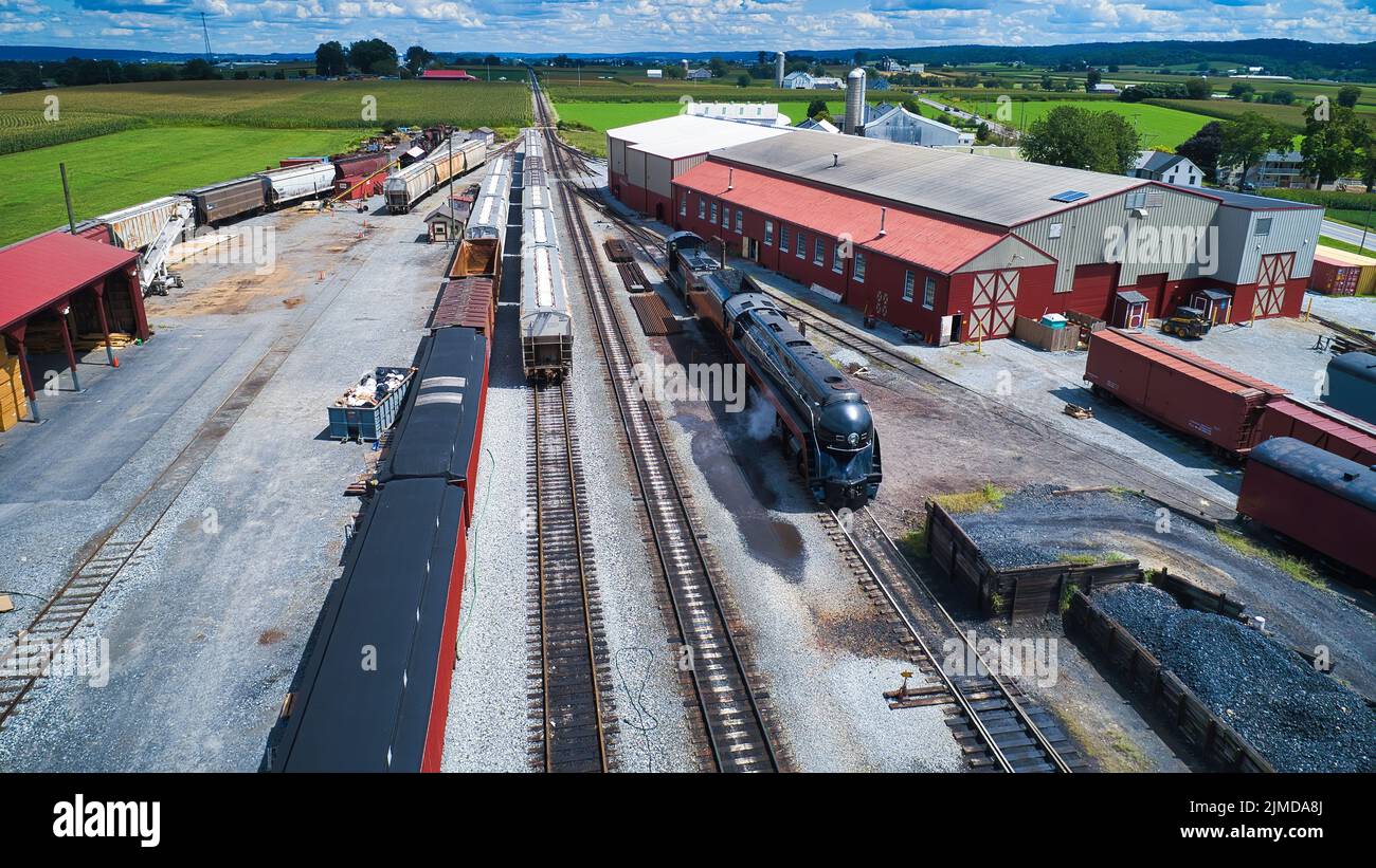 Aerial View of a Restored Antique Steam Engine Blowing Smoke and Steam ...