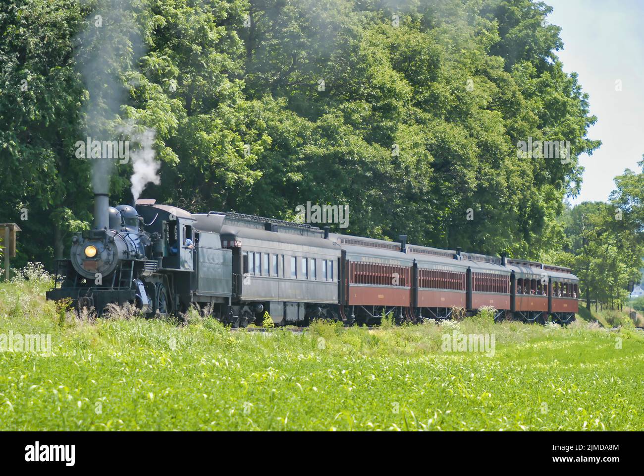 Restored Antique Steam Locomotive with Passenger Cars Stock Photo - Alamy
