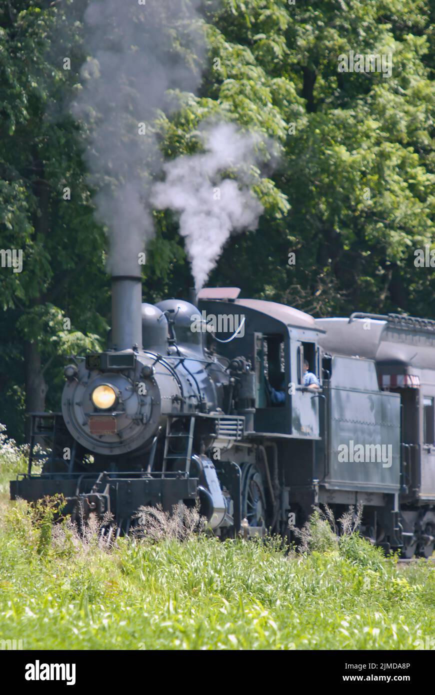 Restored Antique Steam Locomotive with Passenger Cars Stock Photo - Alamy