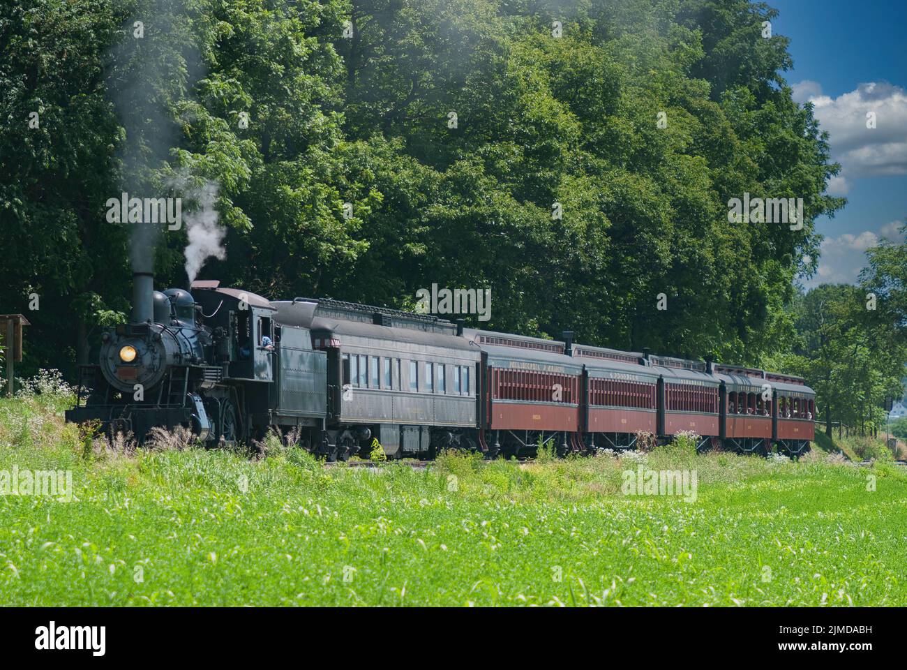 Restored Antique Steam Locomotive with Passenger Cars Stock Photo - Alamy