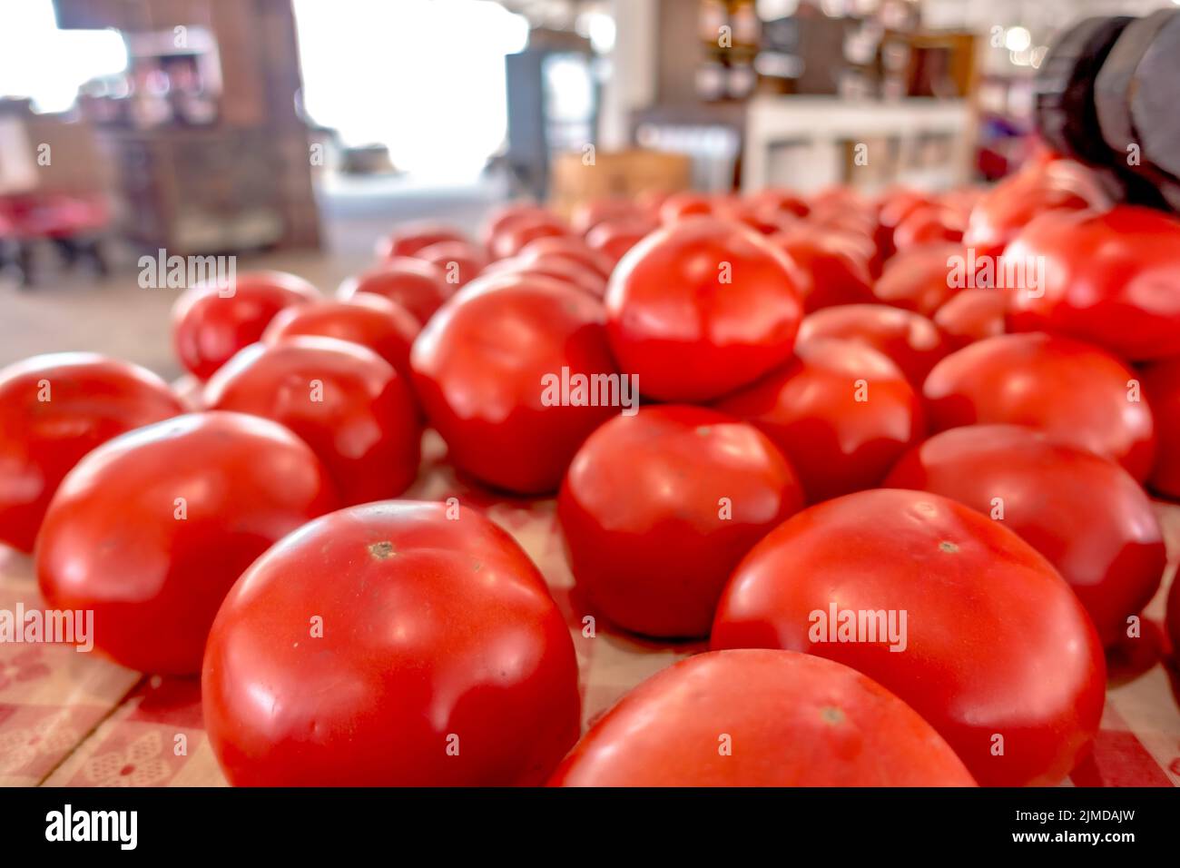 Tasty tomatoes on display at the farm market Stock Photo - Alamy