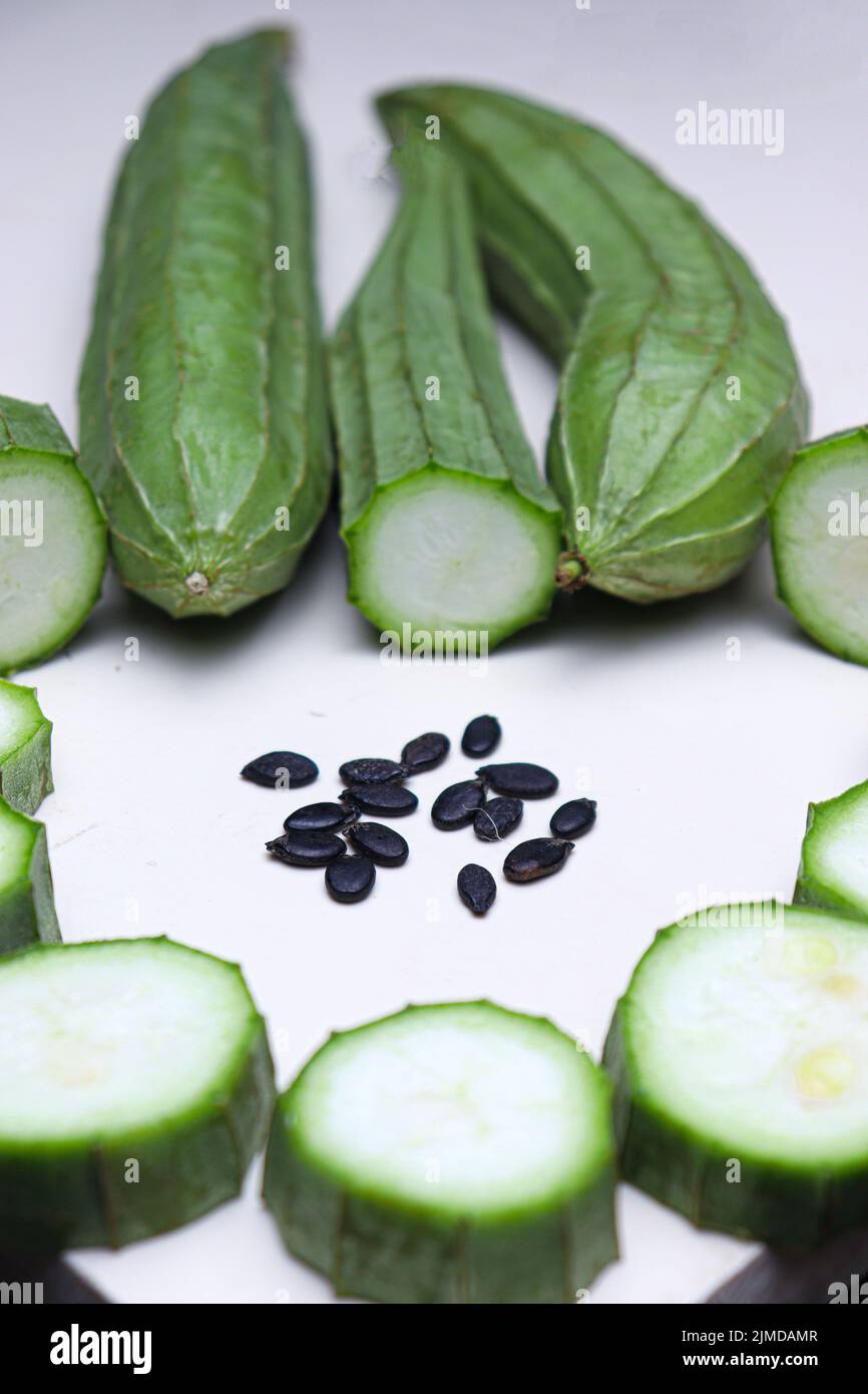 Ridges Gourd stock with seed on farm for farming Stock Photo - Alamy