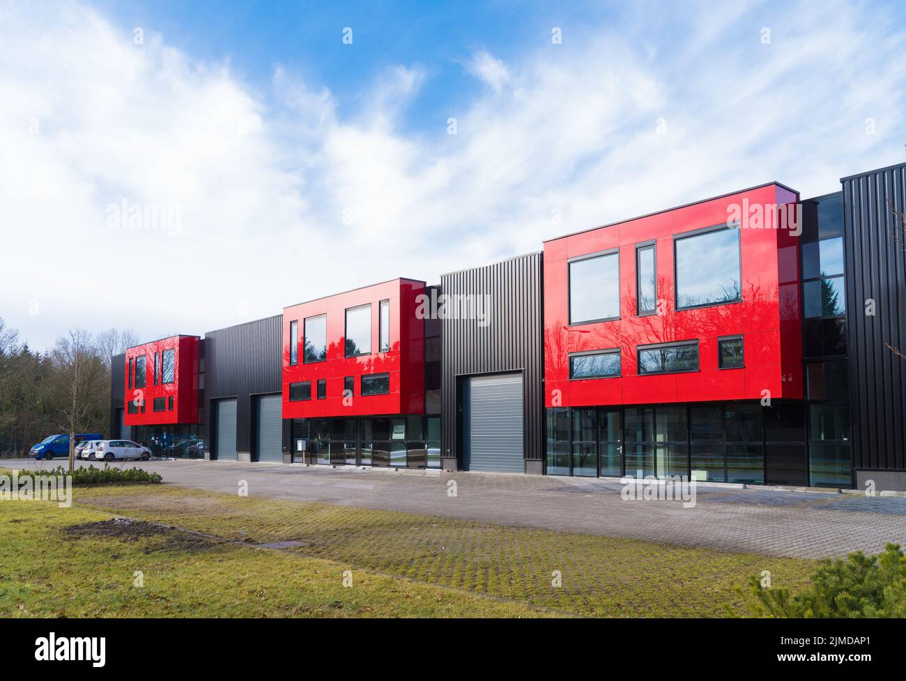 Industrial building with red office units Stock Photo - Alamy