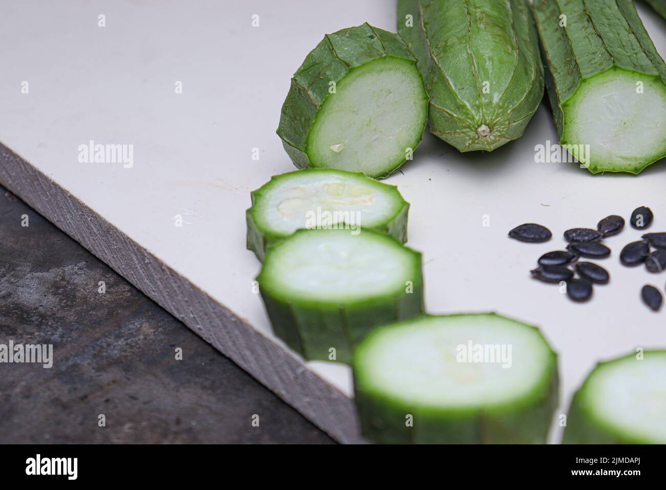 Ridges Gourd stock with seed on farm for farming Stock Photo - Alamy